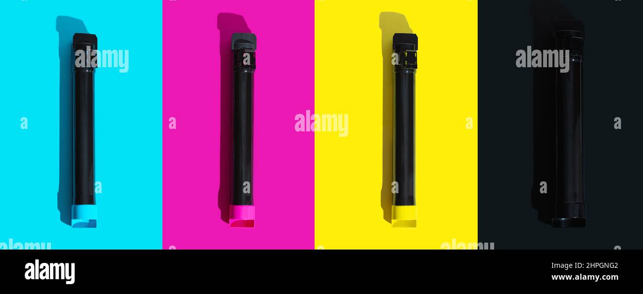 A set of toner cartridges for a color laser printer on the background ...