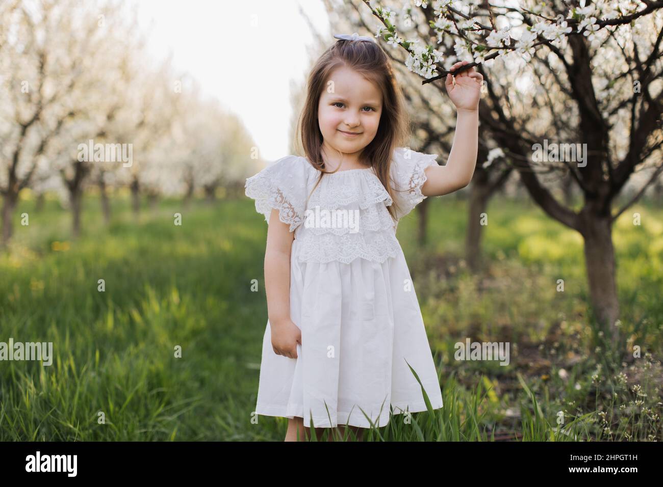 Children apple blossom hi-res stock photography and images - Alamy