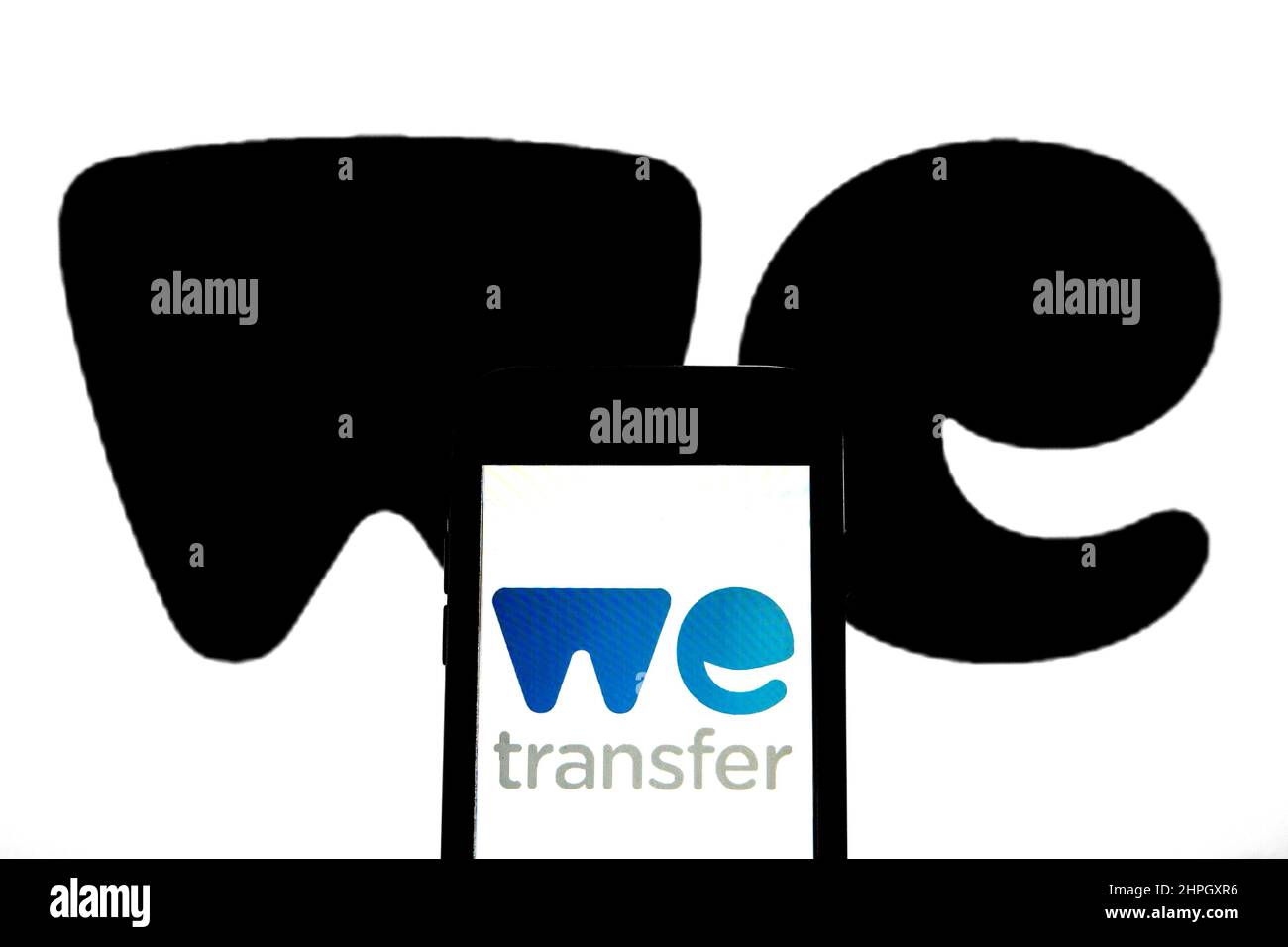 Spain. 17th Feb, 2022. In this photo illustration a WeTransfer logo ...