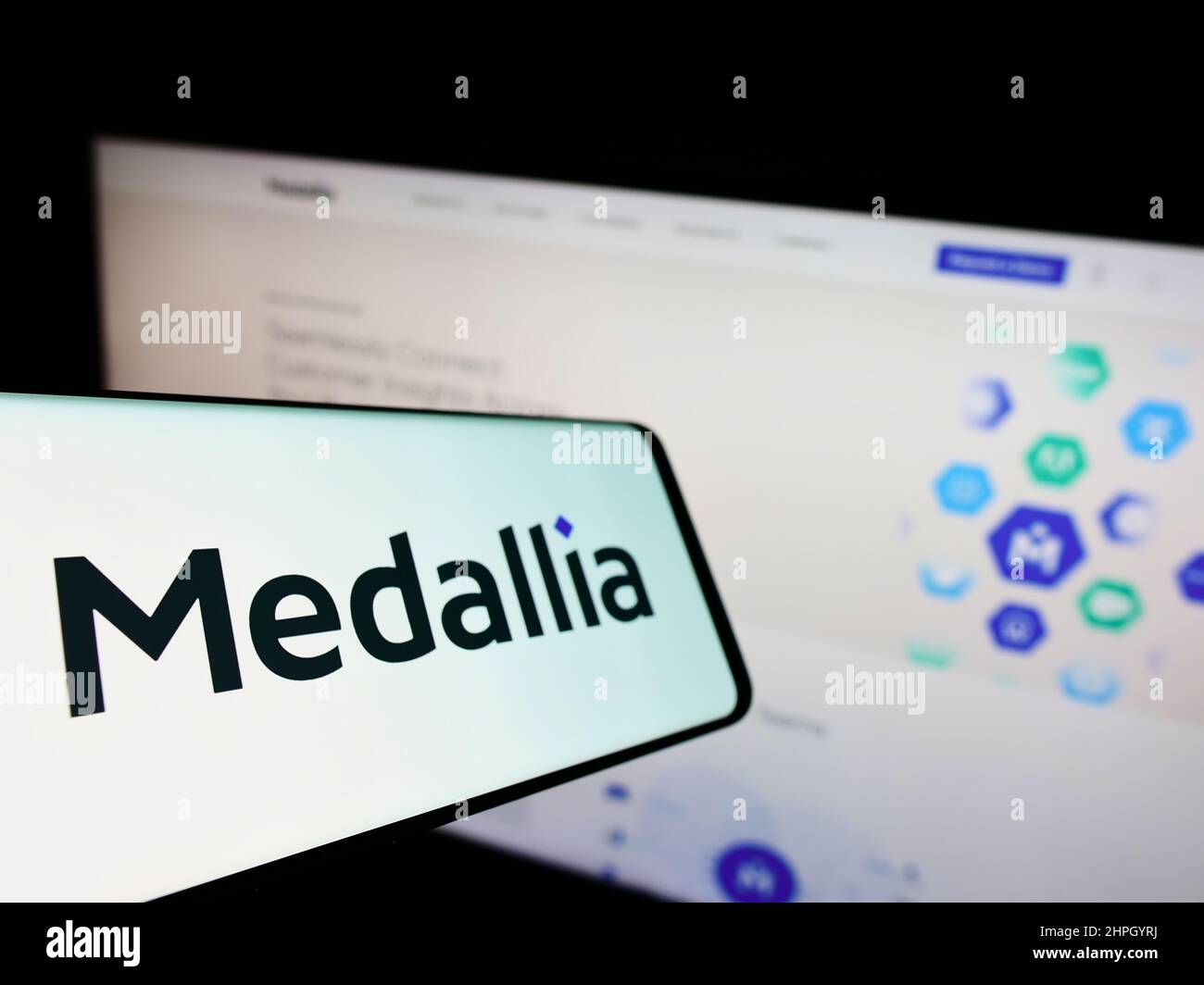 Mobile phone with logo of US customer experience company Medallia Inc ...