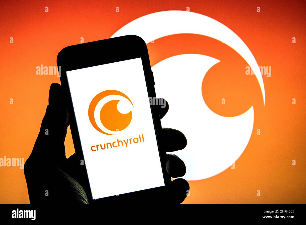 In this photo illustration a Crunchyroll Inc. logo seen displayed on a ...