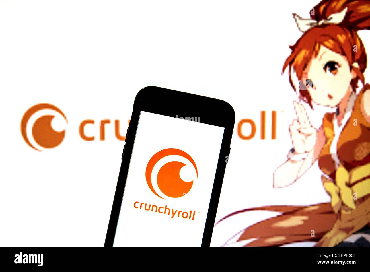 In this photo illustration a Crunchyroll Inc. logo seen displayed on a ...