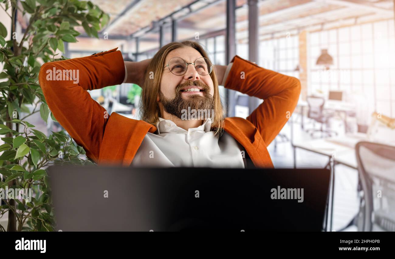 Man resting at office Stock Photo - Alamy