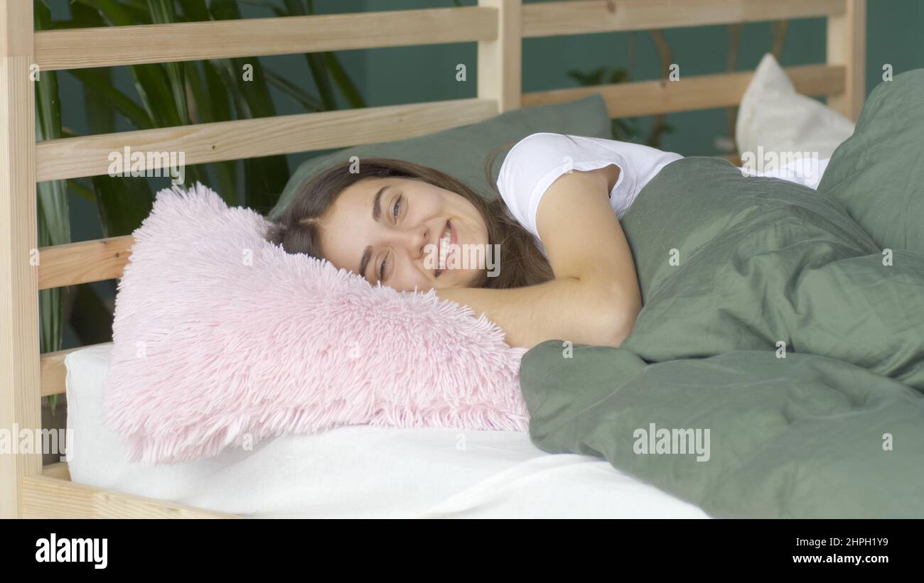 A Young Woman is Studying the Composition of Products Using a Mobile ...