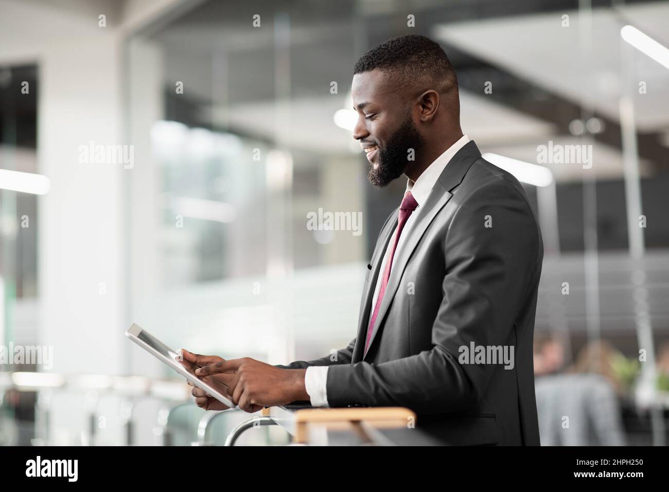 African american man working tablet hi-res stock photography and images ...
