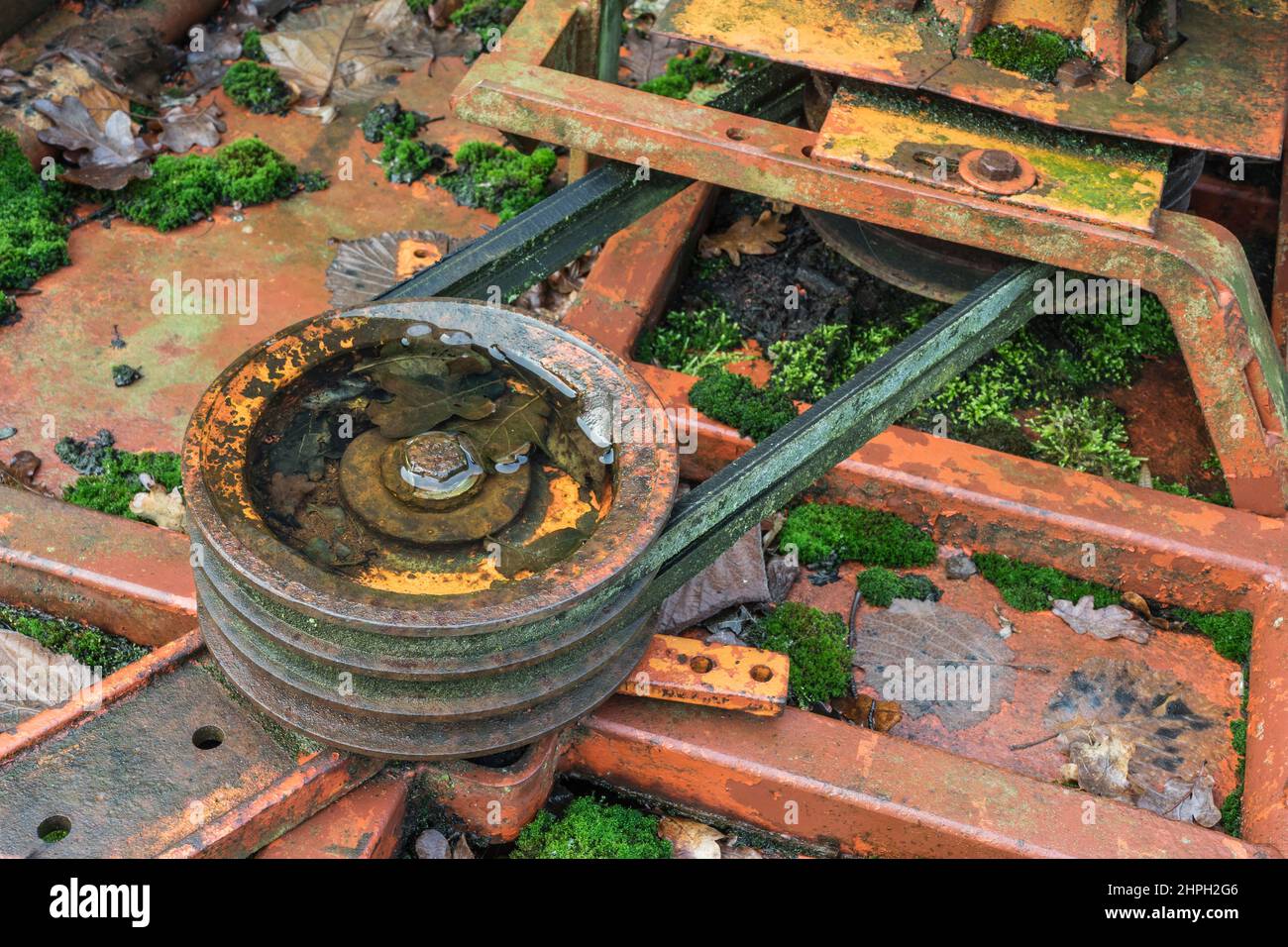 belt drive unit of a rotten machine Stock Photo - Alamy