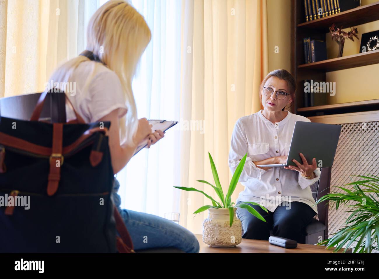 Therapy session of a teenage student girl, professional help of a ...