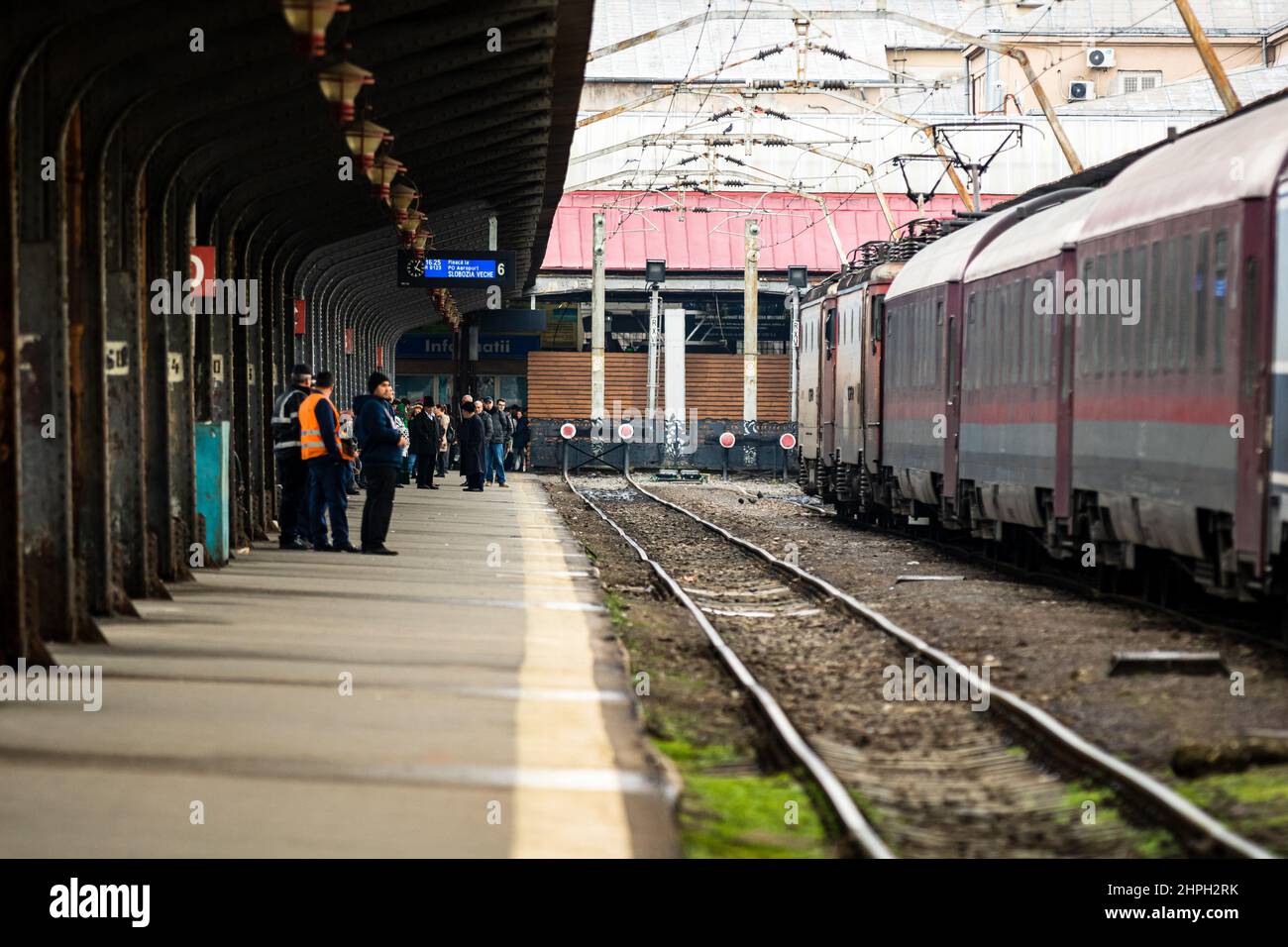 Train in motion or at train platform at Bucharest North Railway Station ...