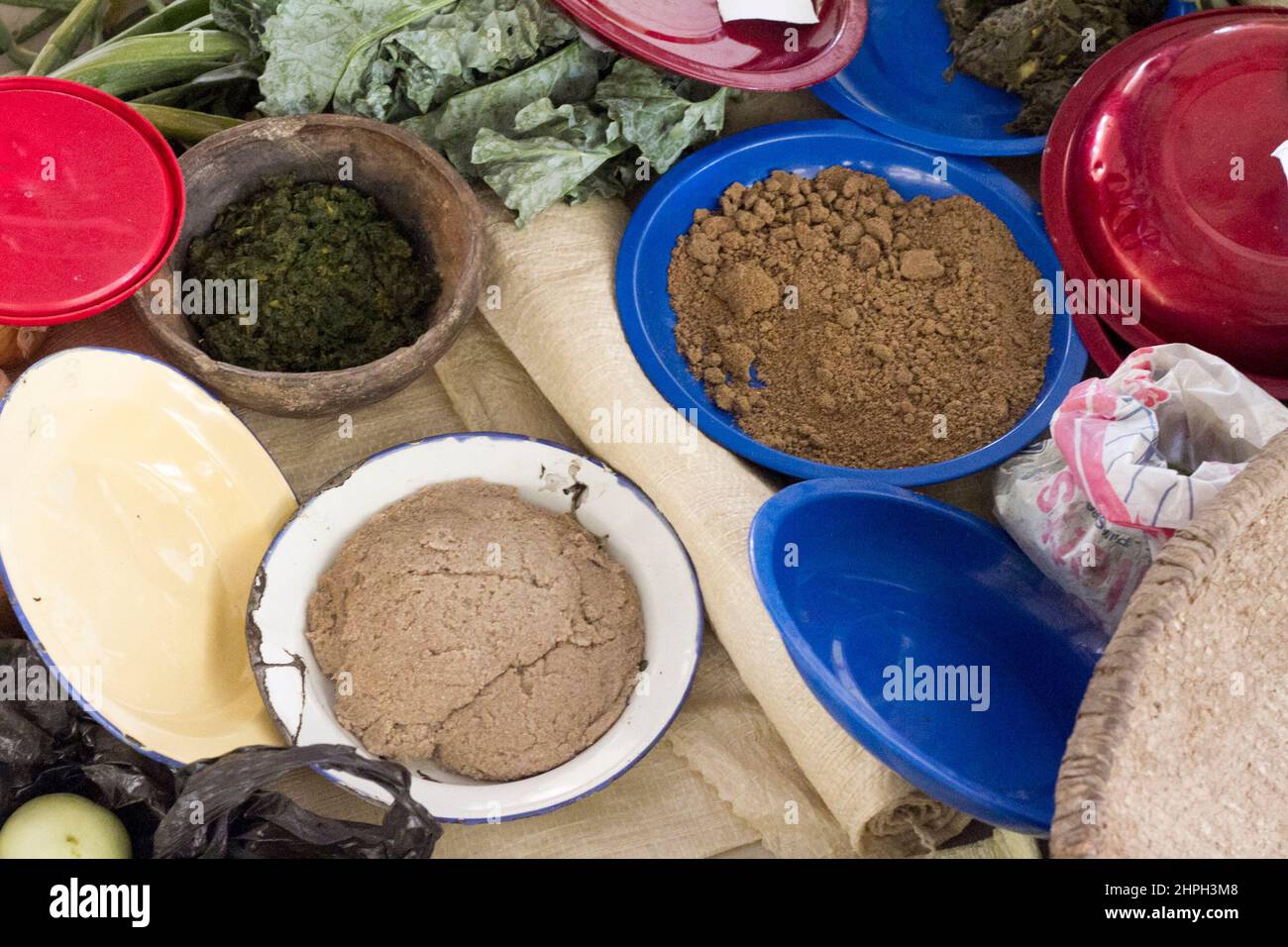 Thick porridge, locally known as 'sadza' made from millet is served ...