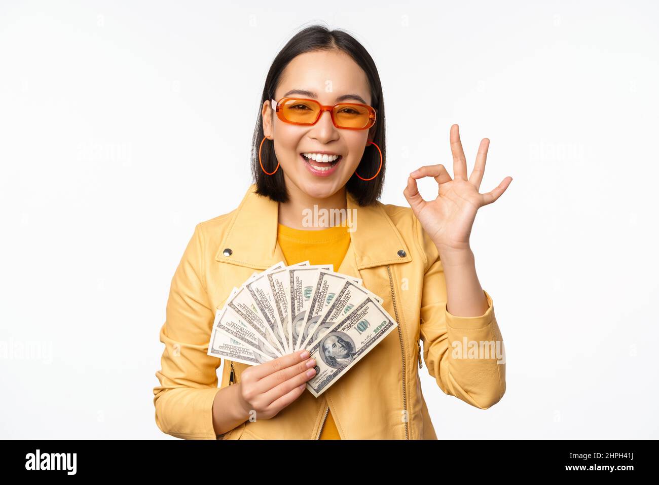 Microcredit and loans concept. Happy stylish korean girl showing okay ...