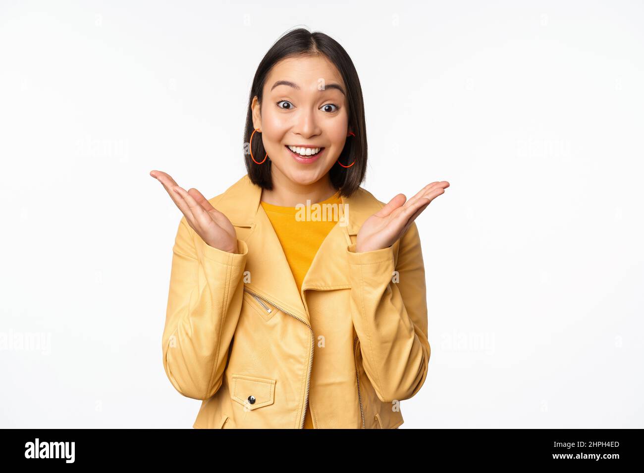 Image of asian woman looking surprised, amazed reaction, shocked face ...