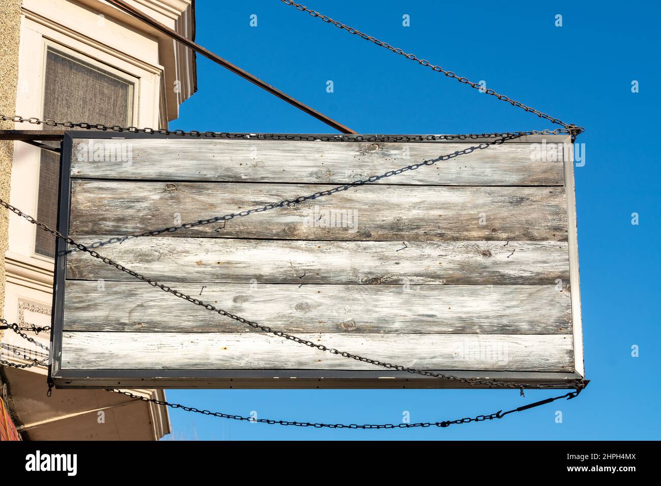 Blank wooden sign on a run down main street. Illinois, USA Stock Photo ...