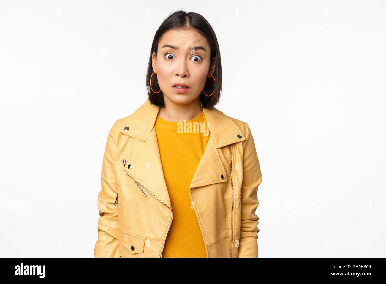 Image of shocked, confused asian woman, staring frustrated and ...