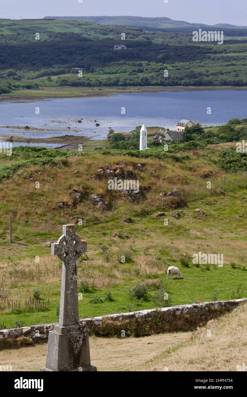 Landscape with celtic cross in the village of Dervaig on the Isle of ...