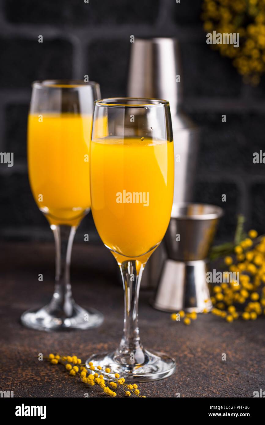 Mimosa cocktail with orange juice Stock Photo - Alamy