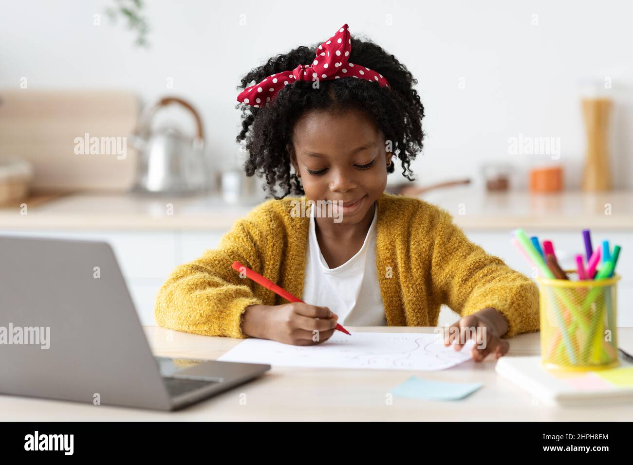 Distance Learning. Little Black Girl Study With Laptop At Home Stock ...