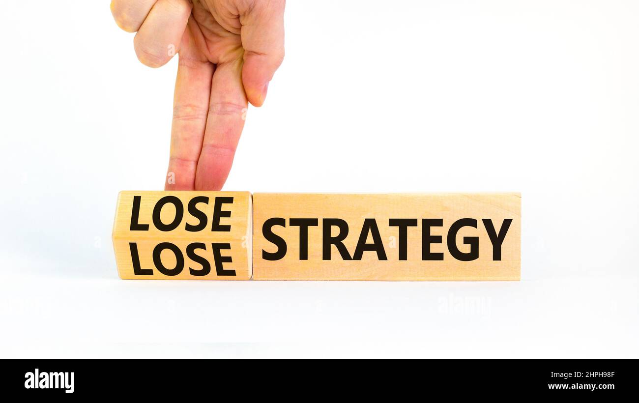 Lose-lose strategy symbol. Businessman turns wooden cubes with words ...