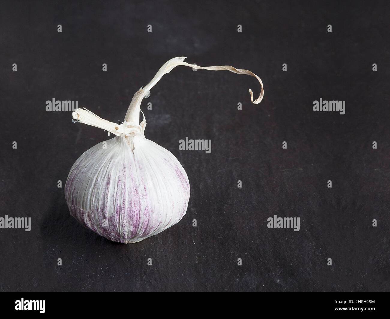 Stylised image of garlic taken in a studio with professional lighting ...