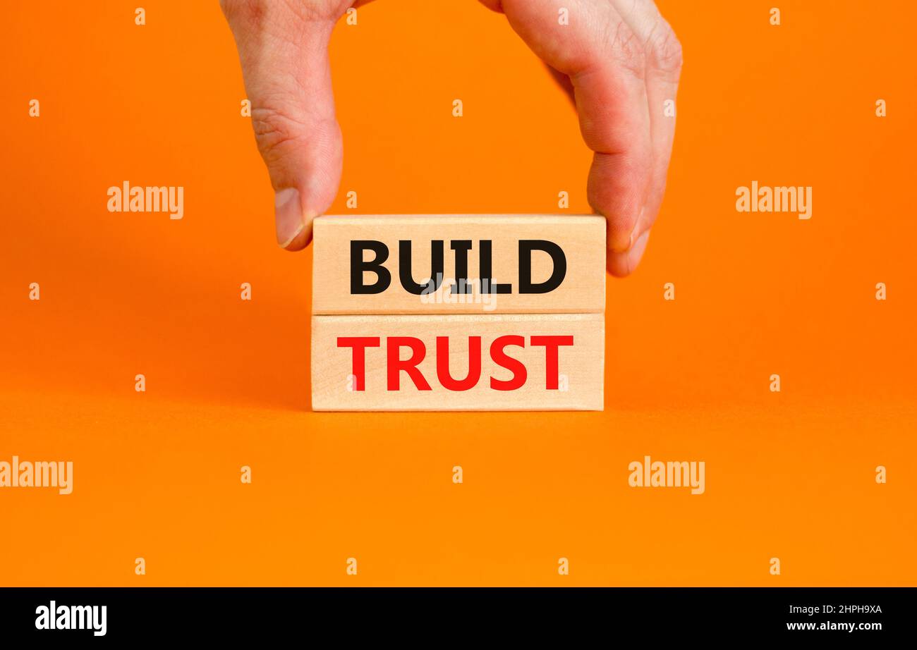 Build trust symbol. Concept words Build trust on wooden blocks on a ...