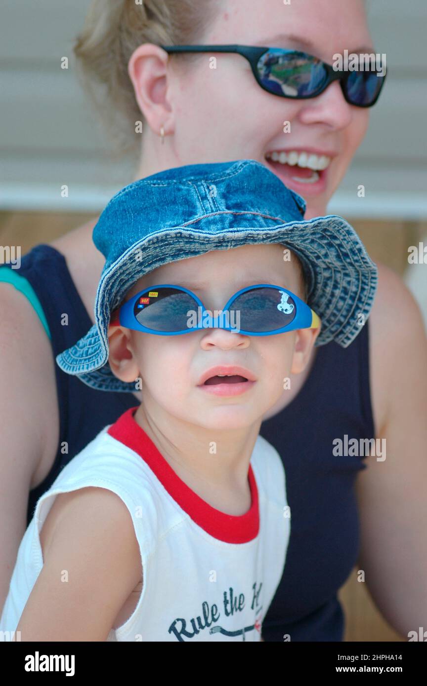 20 month old boy child baby with blue hat and sunglasses and some with ...