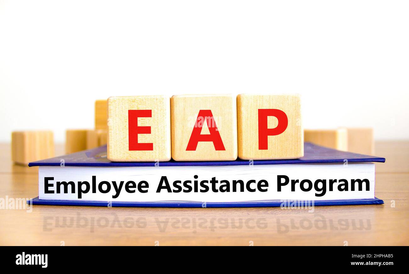 EAP employee assistance program symbol. Concept words EAP employee assistance program on cubes ...