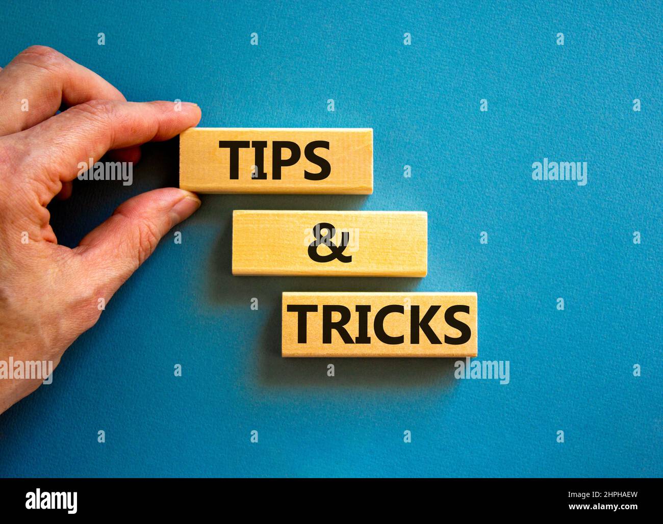 Tips and tricks symbol. Concept words Tips and tricks on wooden blocks ...