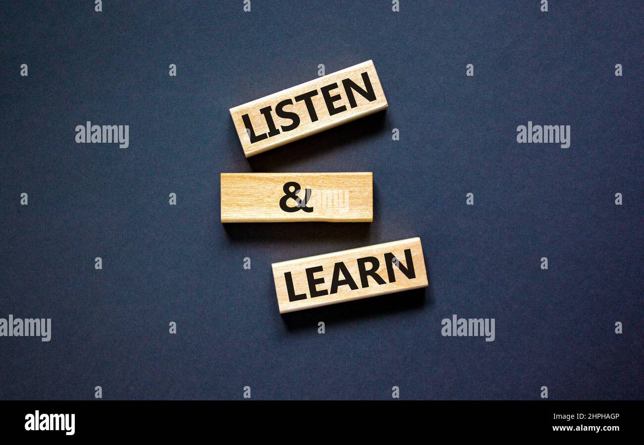 Listen and learn symbol. Concept words Listen and learn on wooden ...