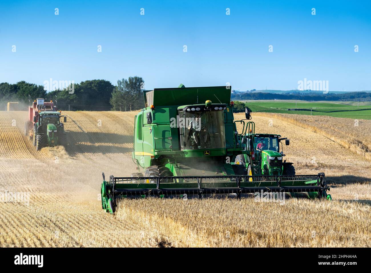 Combining wheat crop with a John Deere T670 combine near Lanark ...