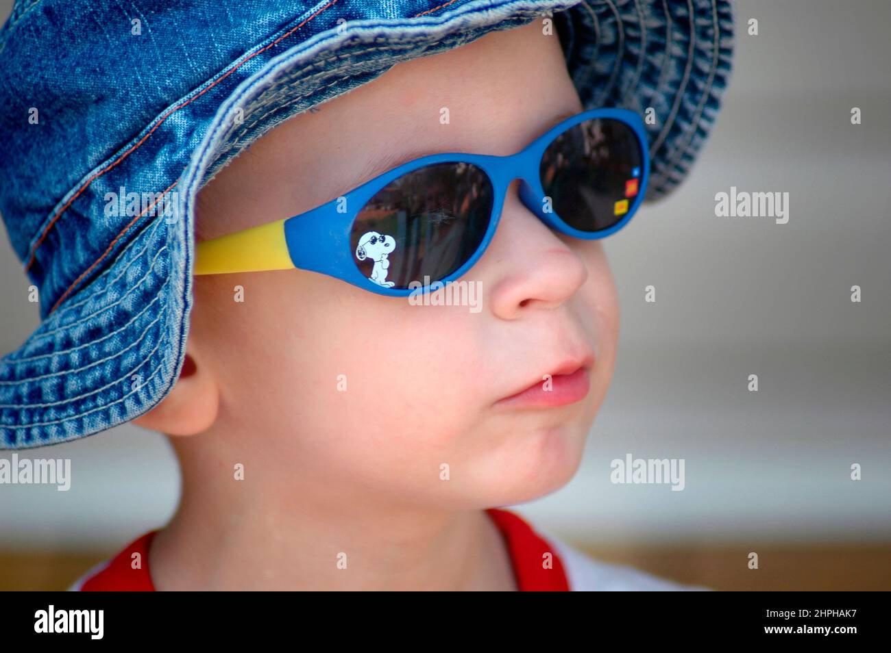 20 month old boy child baby with blue hat and sunglasses and some with ...