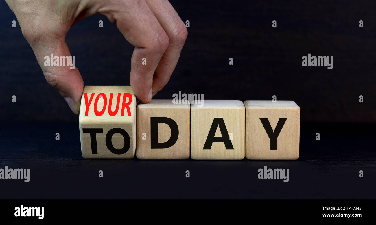 Today is your day symbol. Businessman turns the wooden cube and changes ...