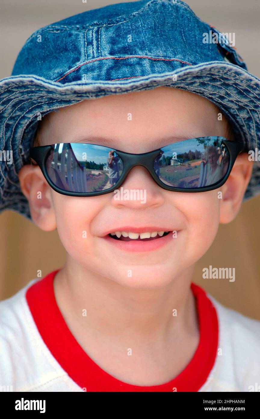 20 month old boy child baby with blue hat and sunglasses and some with ...