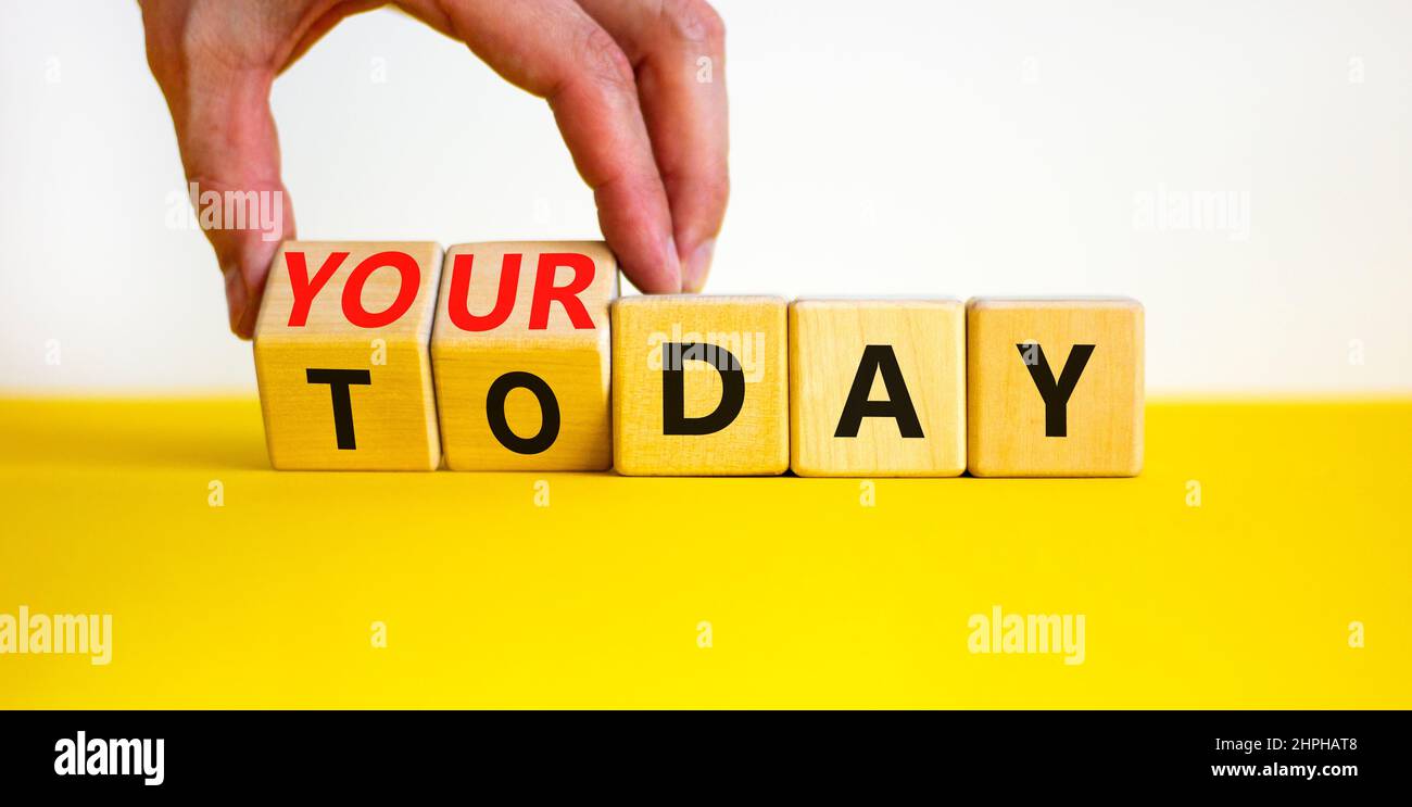 Today is your day symbol. Businessman turns wooden cubes and changes ...