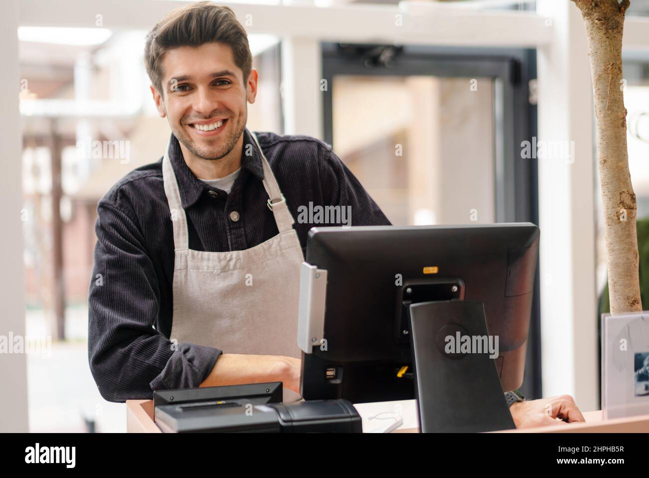 Man cash register hi-res stock photography and images - Alamy