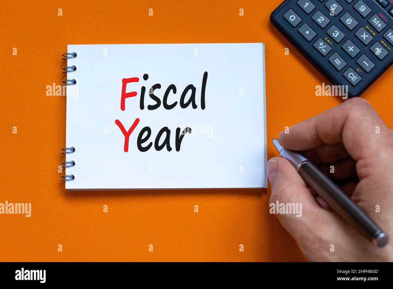 FY Fiscal year symbol. Concept words FY Fiscal year on white note ...