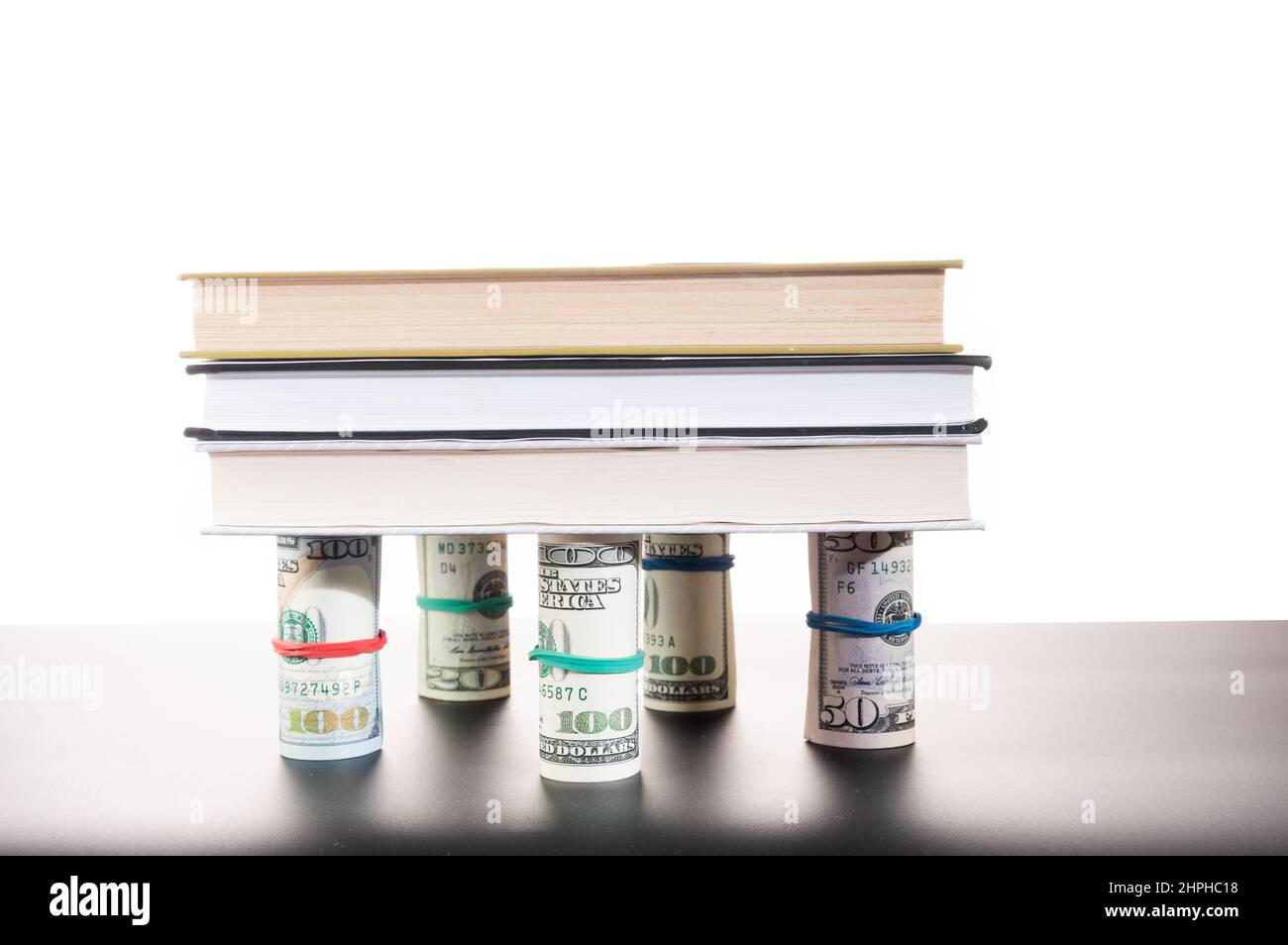 Books on money racks. Knowledge on money. Money information. Books and ...