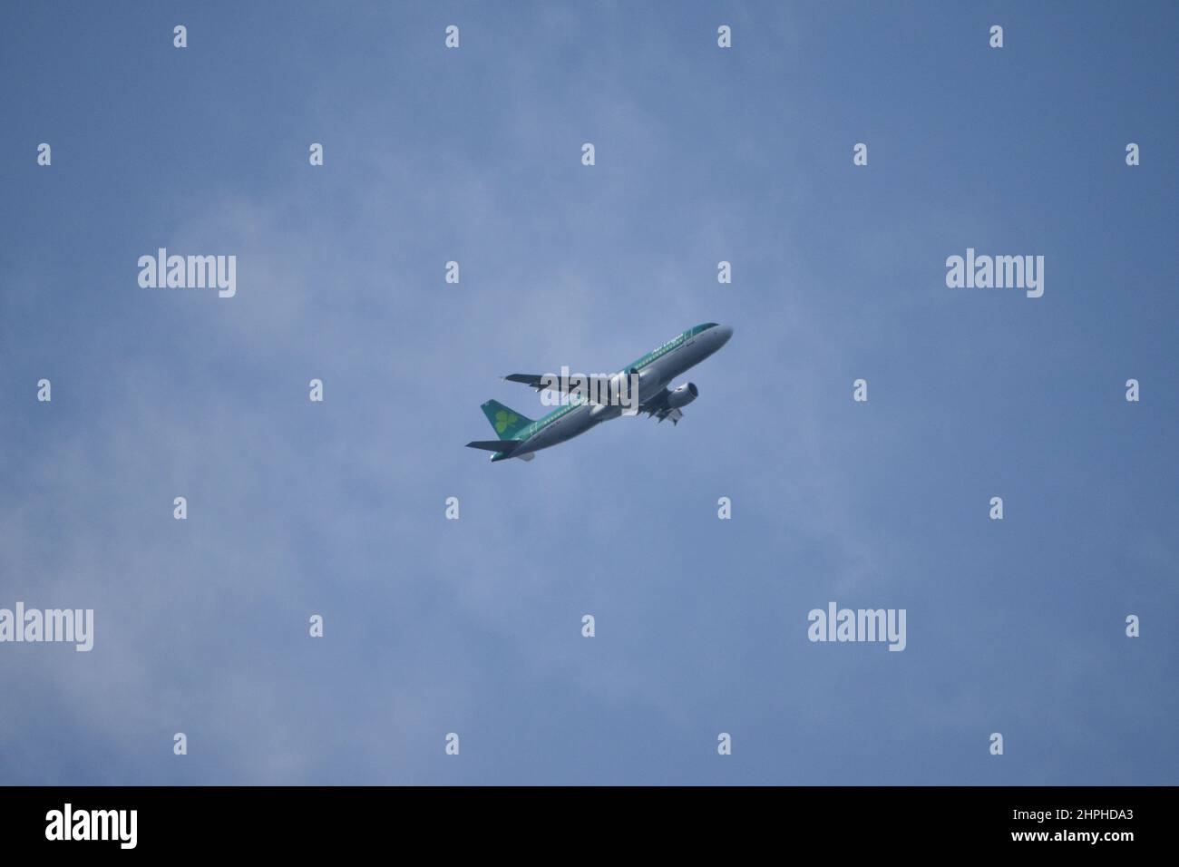 Airplane flying across Cork city. Cork City. Ireland Stock Photo - Alamy