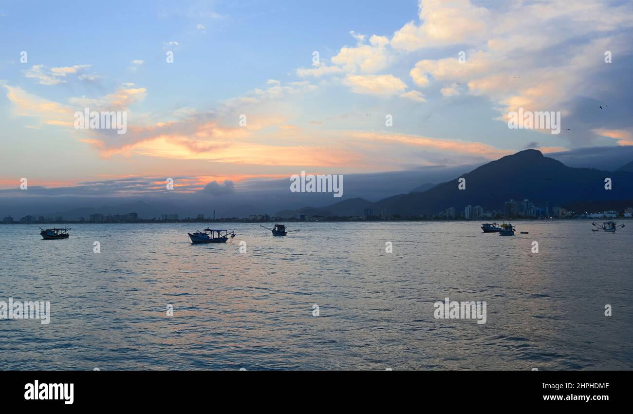 Sunset on brazilian beach boats hi-res stock photography and images - Alamy