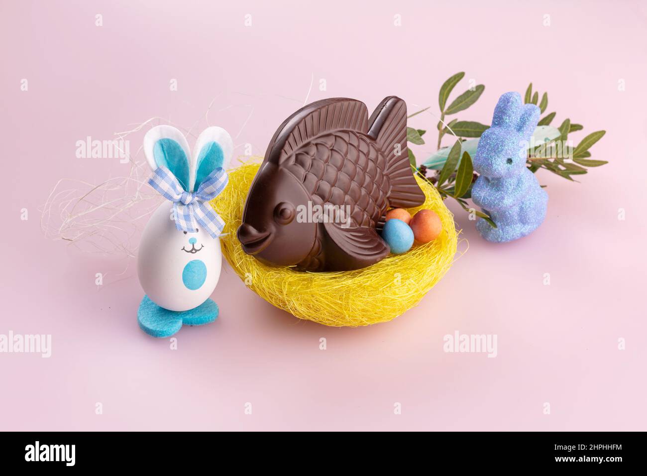 Delicious Easter chocolate assortments on a pink table Stock Photo - Alamy