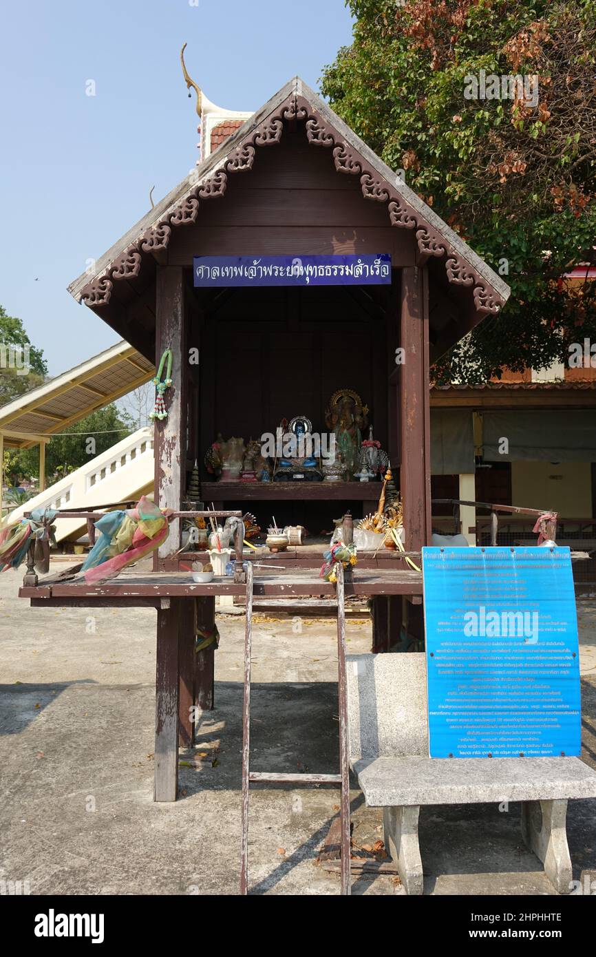 Small wooden Buddhist shrine (vertical picture Stock Photo - Alamy