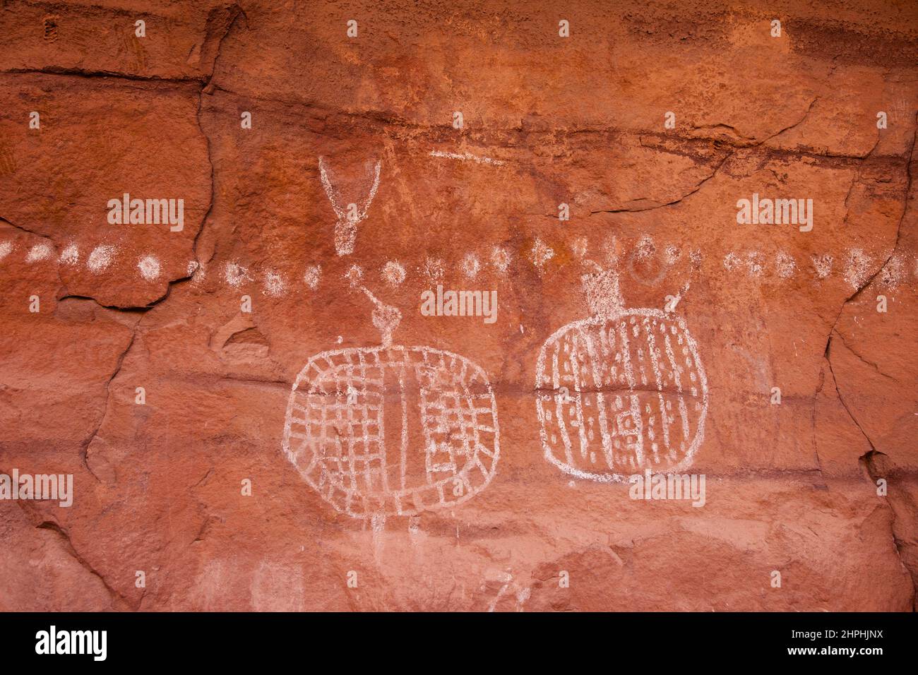This ancient Native American rock art panel, called the Peekaboo Panel ...