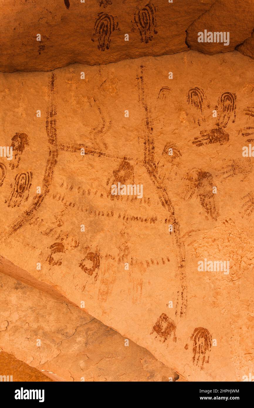 An ancient painted Native American rock art or pictograph panel with ...