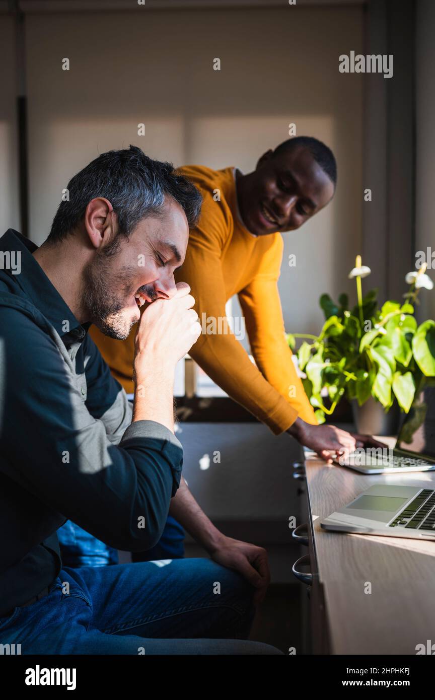 Laughing working hi-res stock photography and images - Alamy