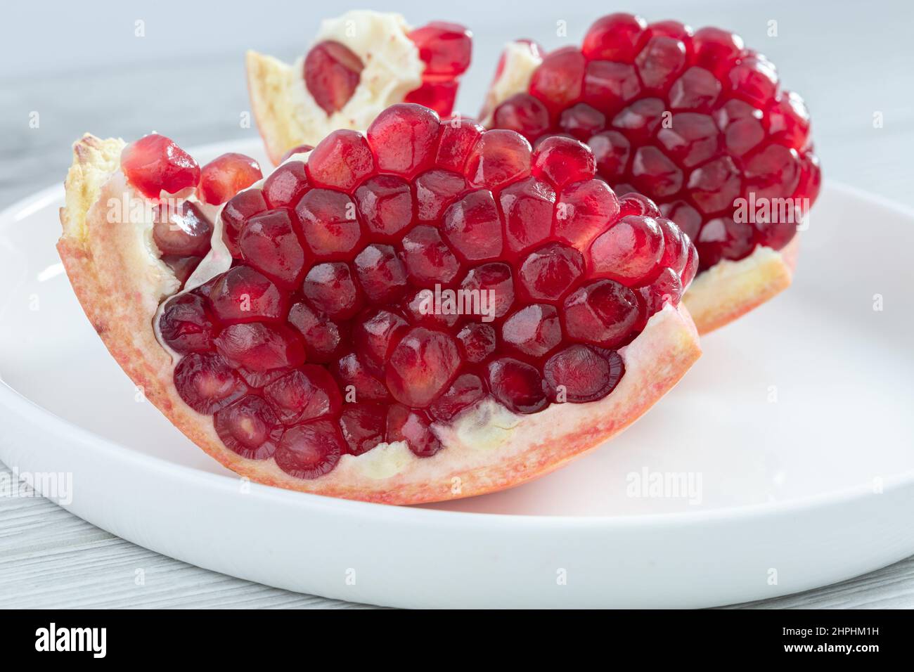 Macro shot two pomegranate hi-res stock photography and images - Alamy