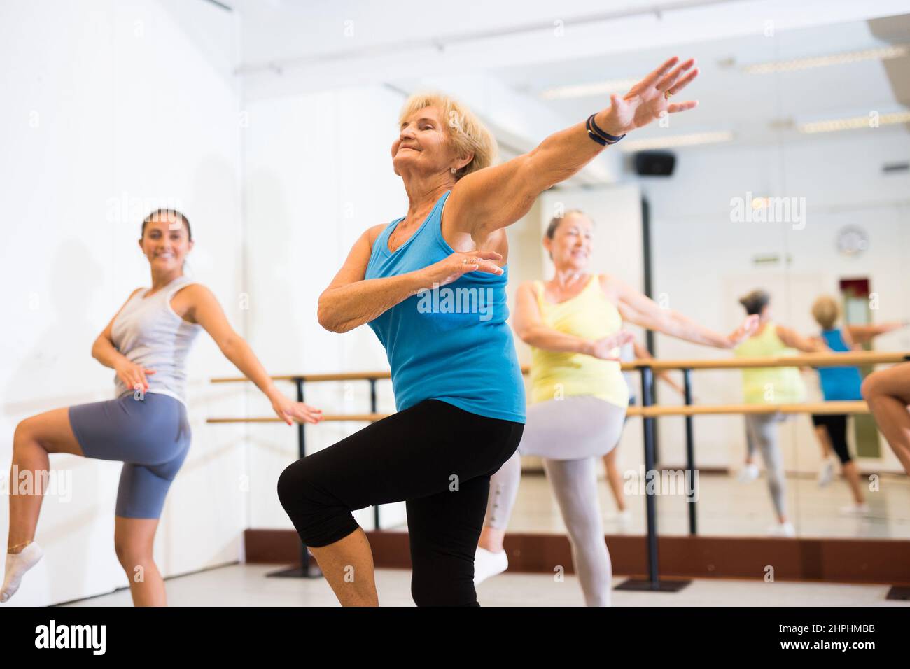 Group of adult people practicing dance techniques Stock Photo - Alamy