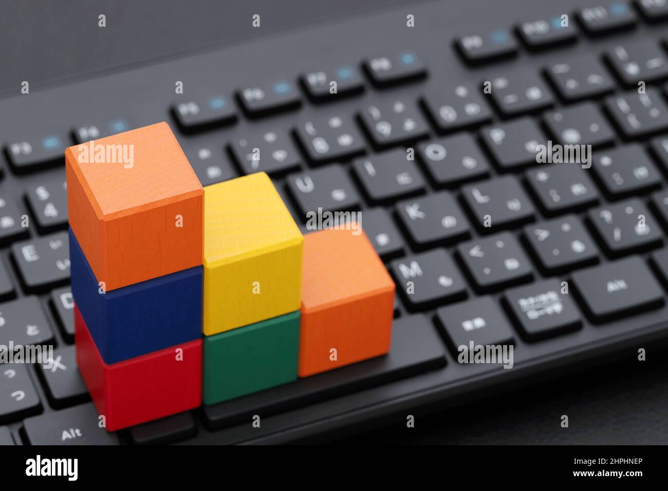 toy block step stairs on computer keyboard on black table Stock Photo ...