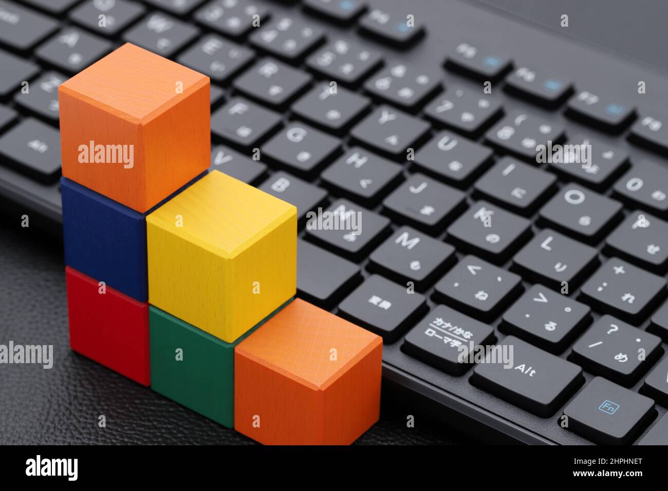 toy block step stairs and computer keyboard on black table Stock Photo ...