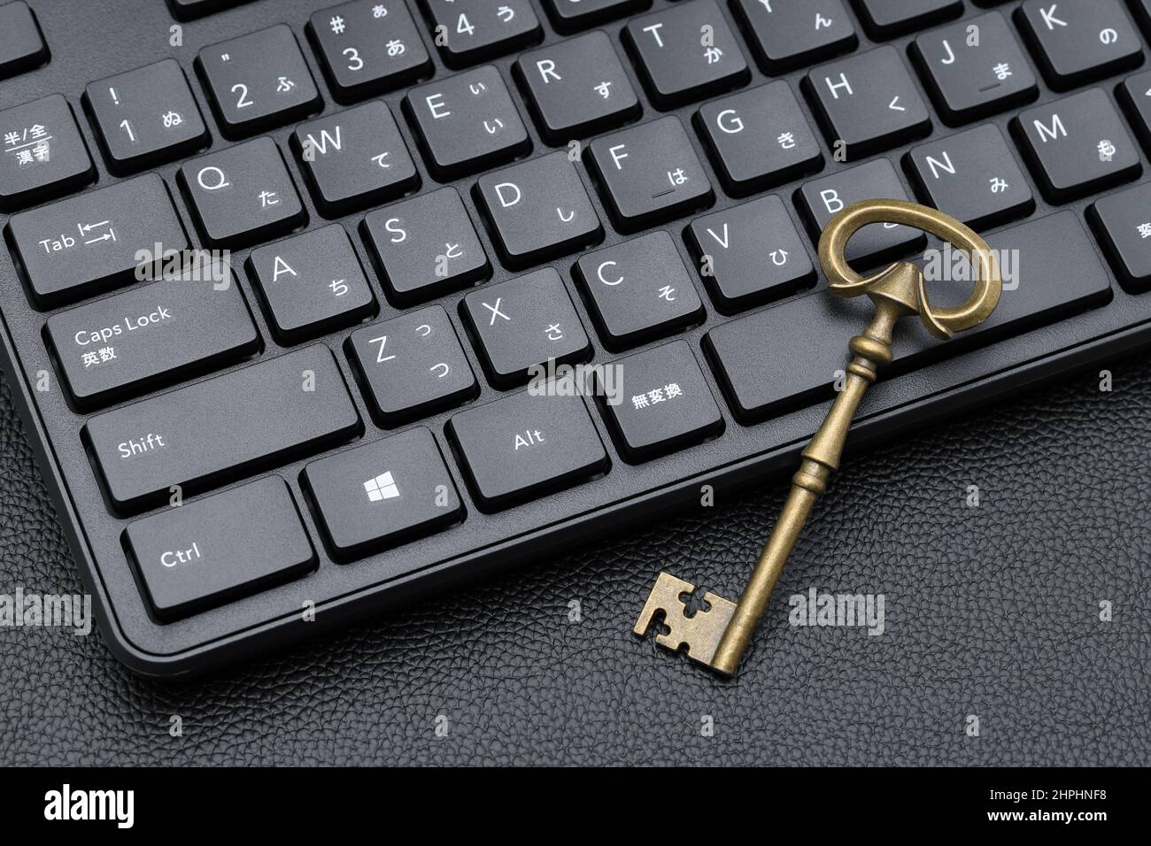 old key and computer keyboard. Concept of Internet security, data ...