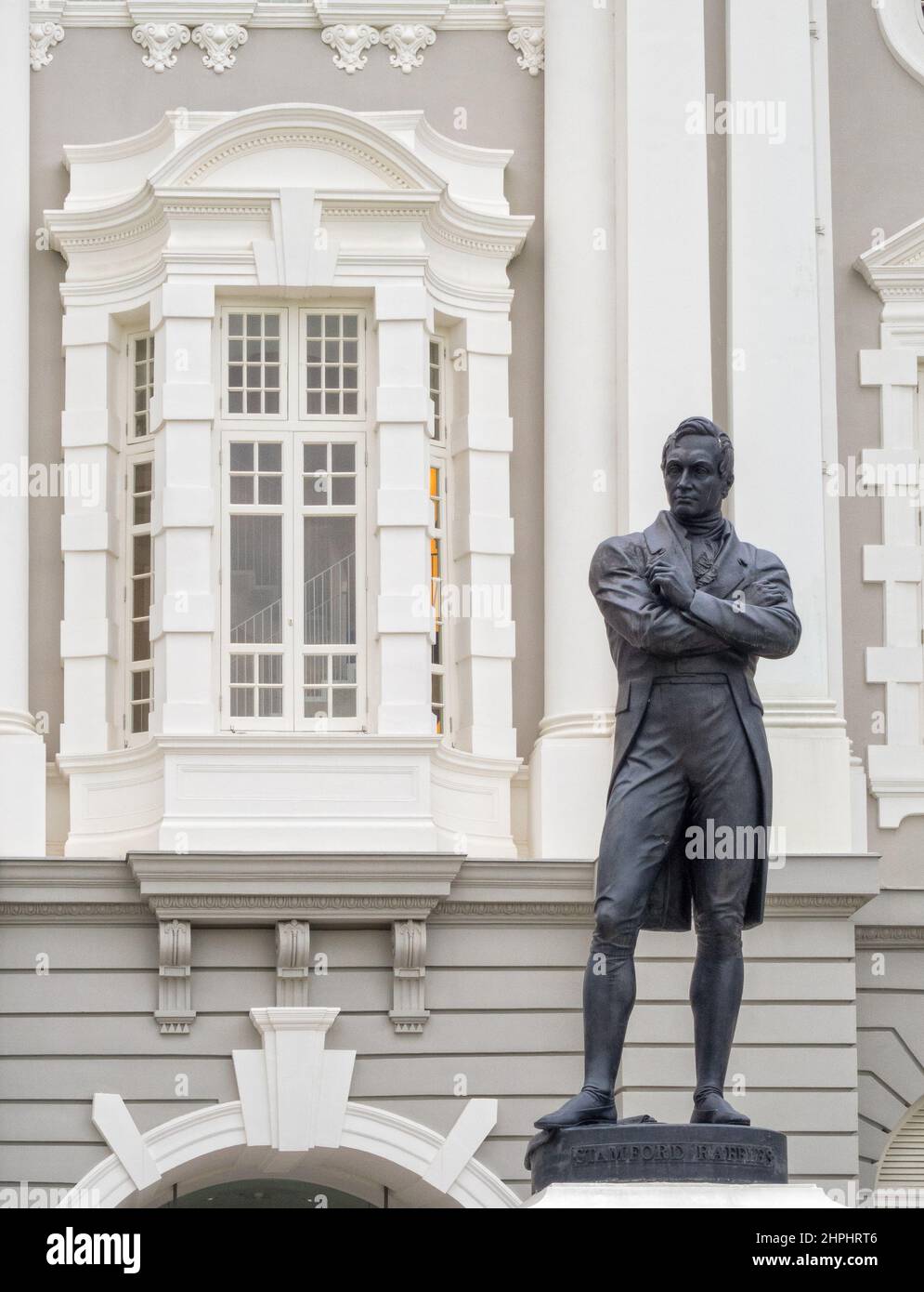 Bronze statue of Stamford Raffles, founder of modern Singapore, by Thomas Woolner in front of ...