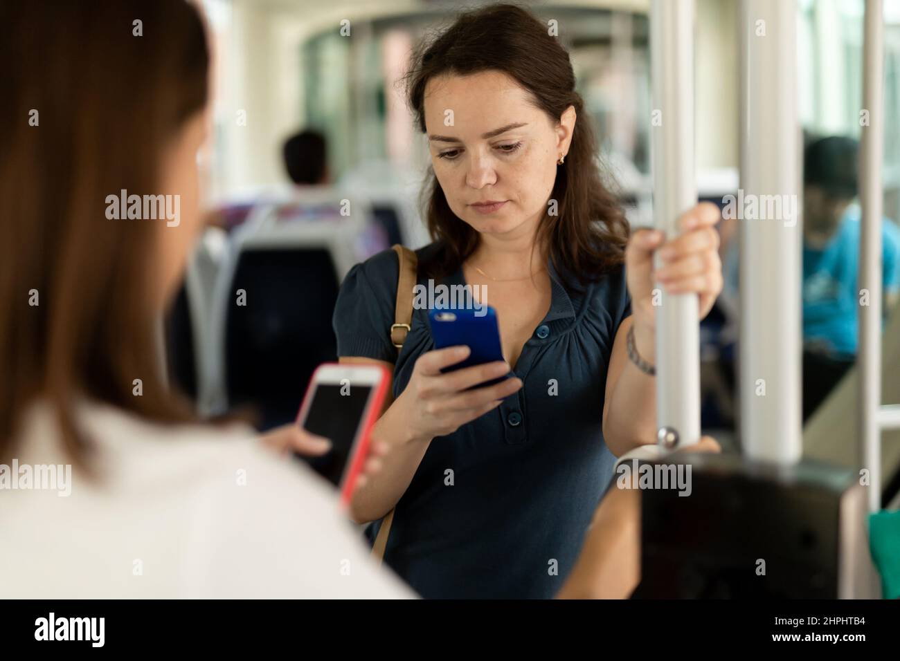 Female caucasian passenger using cellphone hi-res stock photography and ...