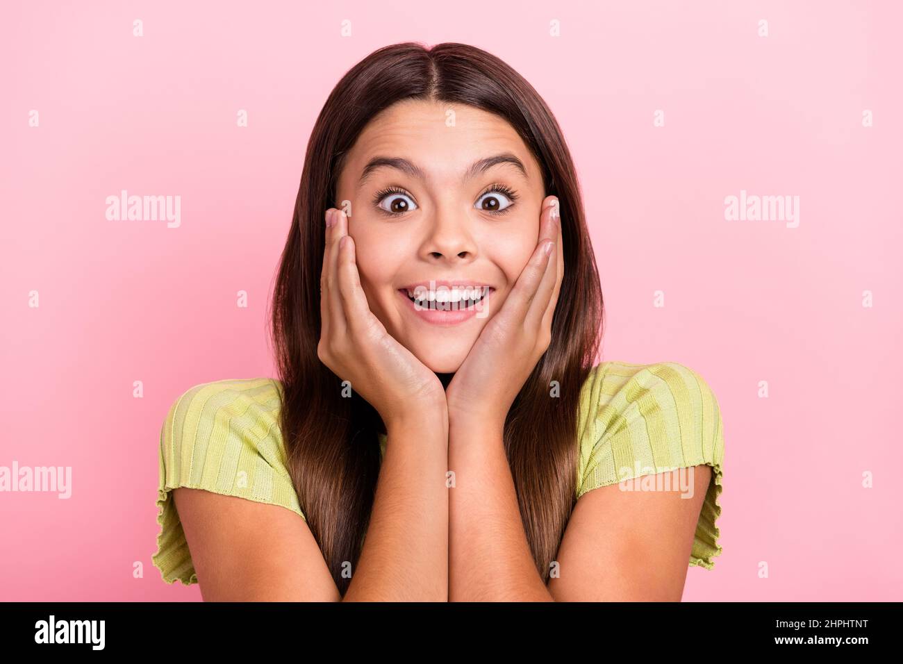 Photo Of Cheerful Excited Lady Hands Cheeks Look Camera Omg Reaction